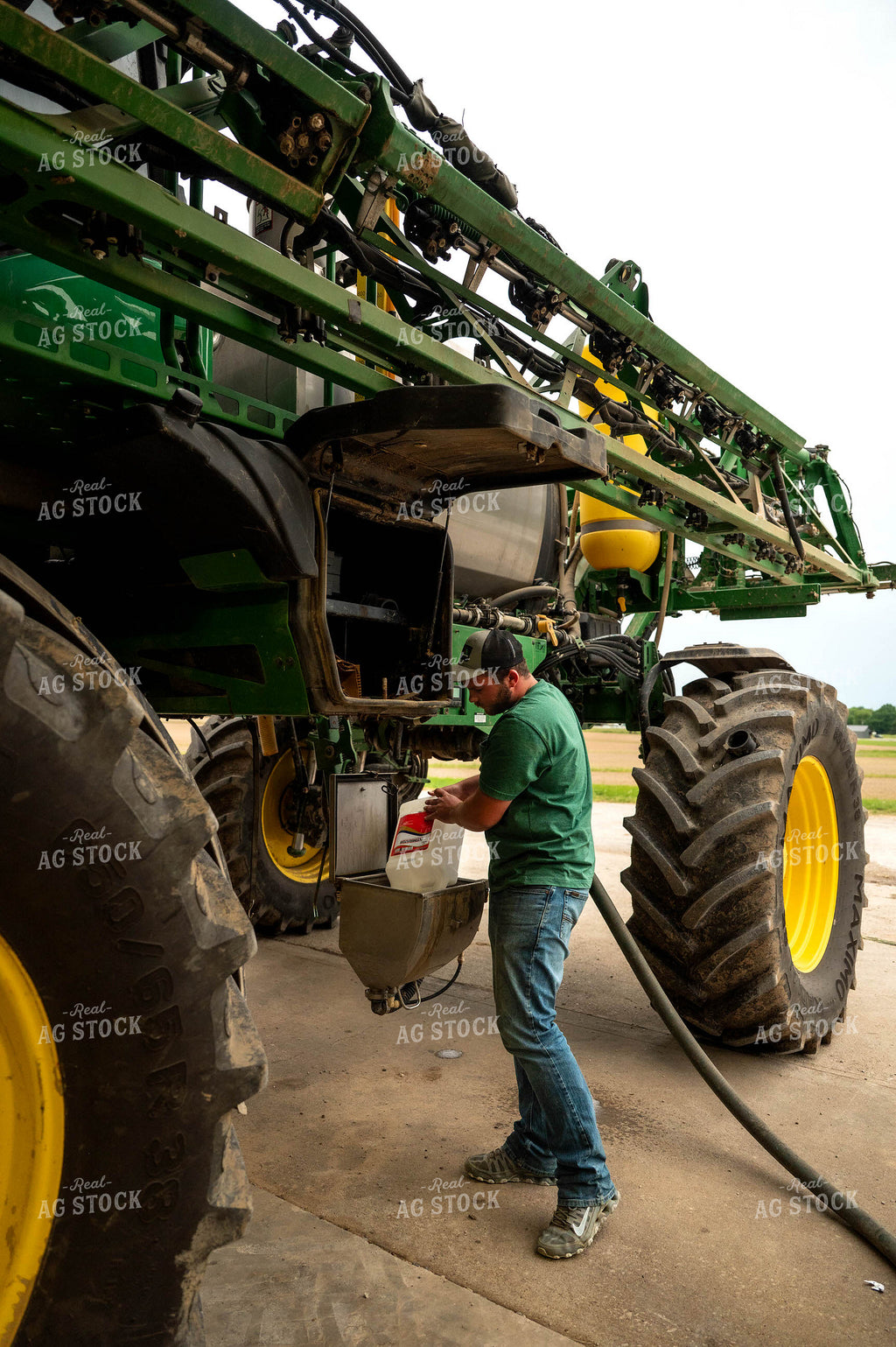 Farmer Filling Self-Propelled Sprayer 115742 – Real Ag Stock